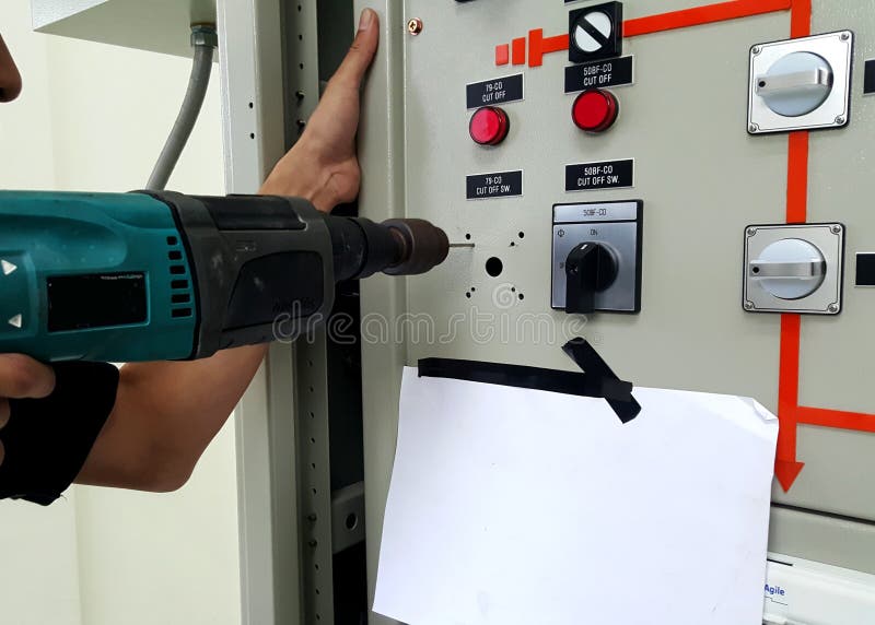 Electrician Used Electrical Drill Making Hole in Front of Control Panel ...