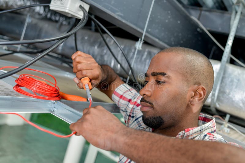 Electrician Using Cable Cutters Stock Image - Image of installing ...
