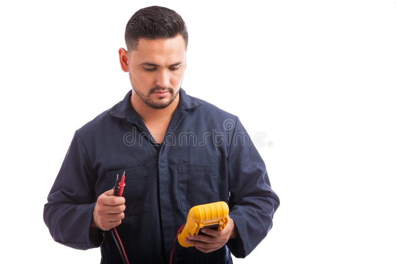 Electrician Using a Multimeter Stock Photo - Image of multimeter ...