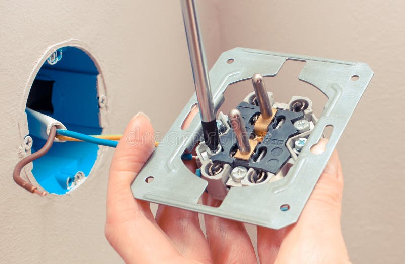 Electrician Using Screwdriver and Installing Power Socket Stock Image ...