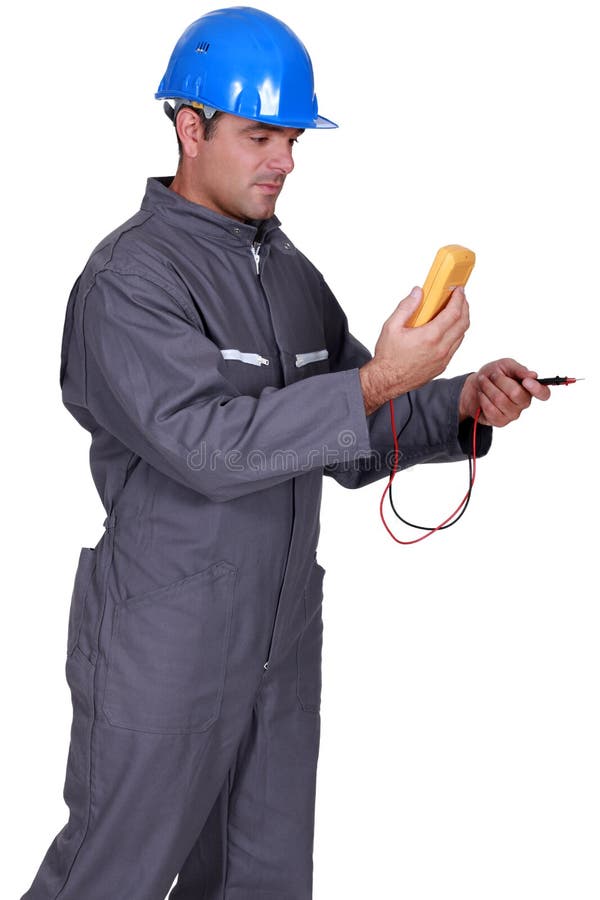 Electrician with voltmeter stock photo. Image of construction - 30592806
