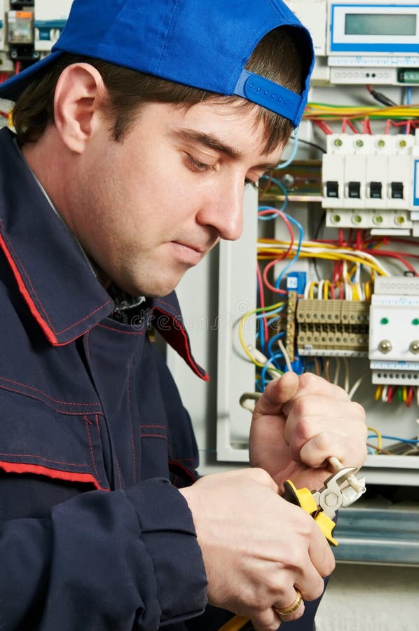 Electrician at work stock photo. Image of cabling, mechanic - 20260986