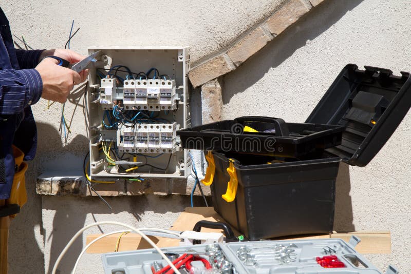 Electrician at work editorial stock image. Image of circuit - 74172329