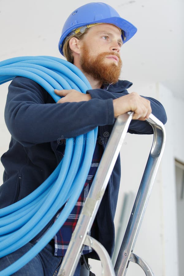 Electrician at Work with Electrical Cables Stock Photo - Image of ...