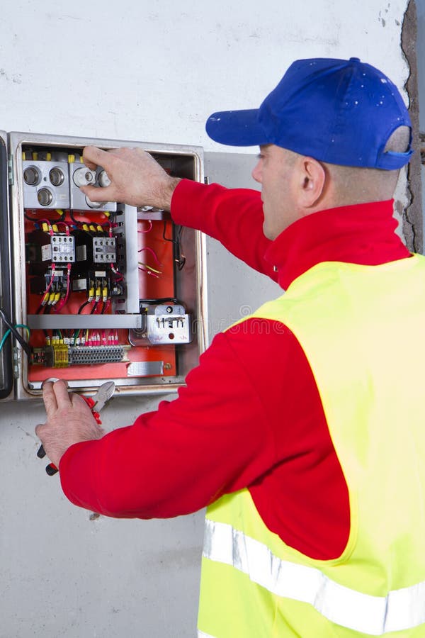 Electrician at work stock image. Image of collar, energy - 20802815