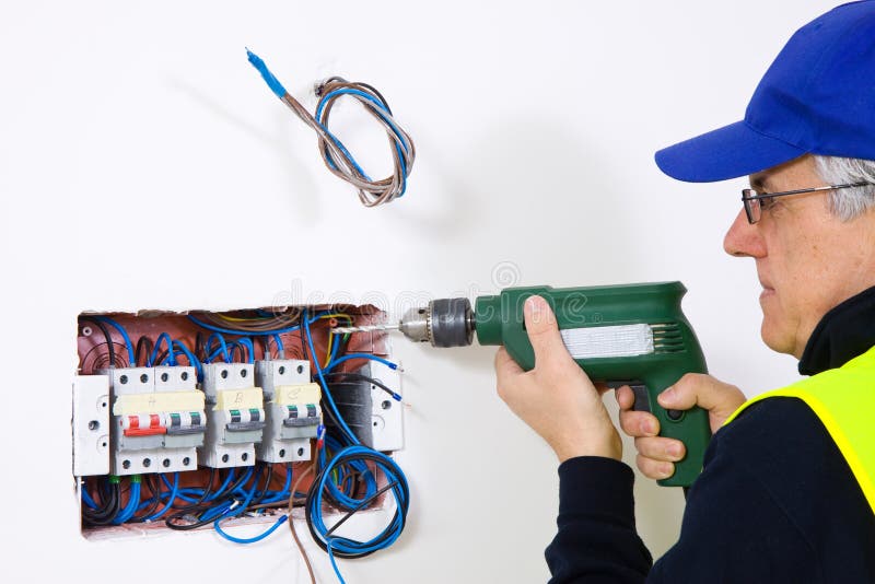 Electrician at work stock image. Image of electrician - 34798309