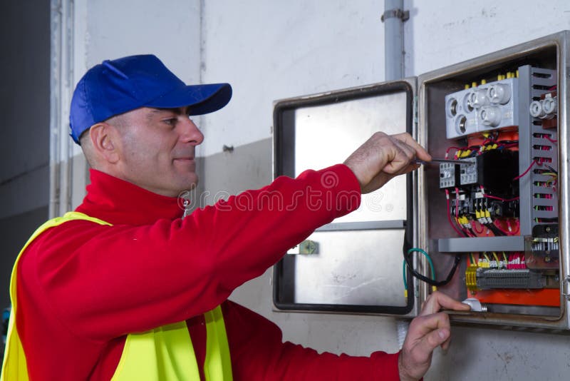 Electrician at work stock photo. Image of mounting, industrial - 51015862