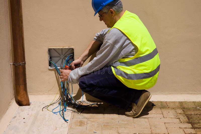 Electrician at Work in a Plant Stock Photo - Image of installing ...