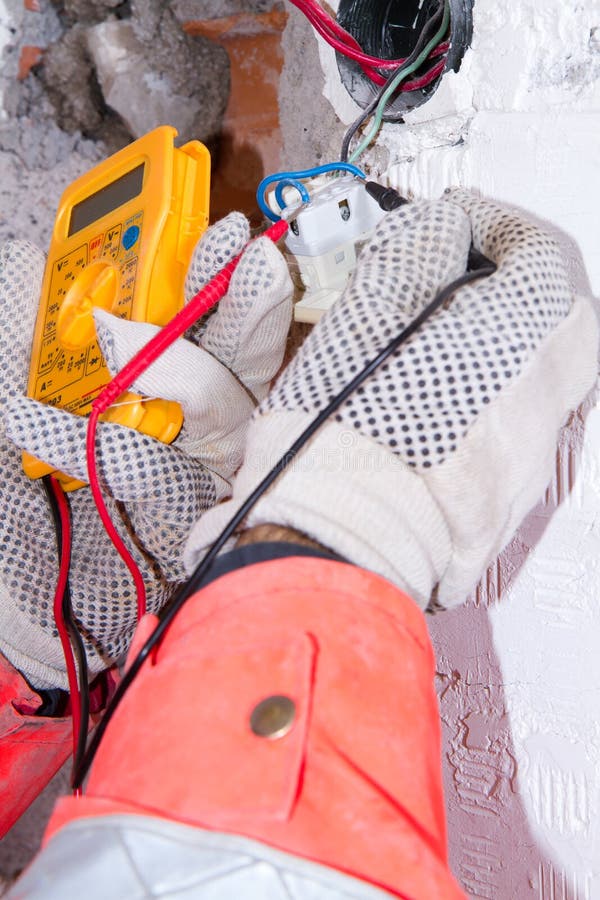 Electrician at work stock image. Image of appliance, professional ...