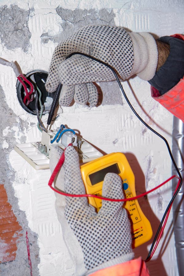 Electrician at work stock image. Image of maintenance - 76792179