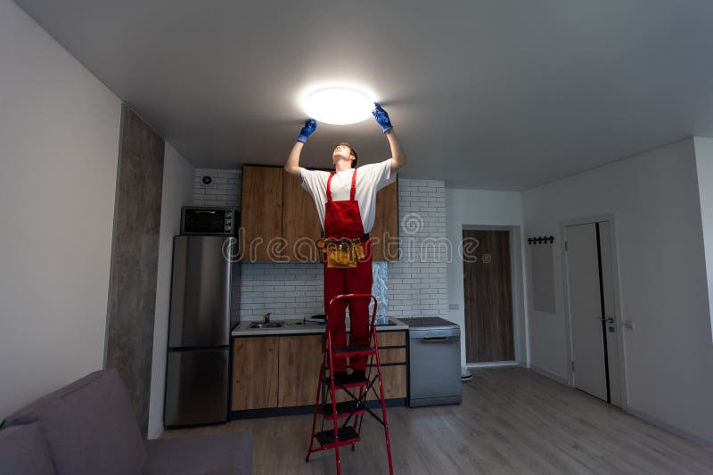 Electrician at Work. Service for the Repair of Electrical Wiring and ...