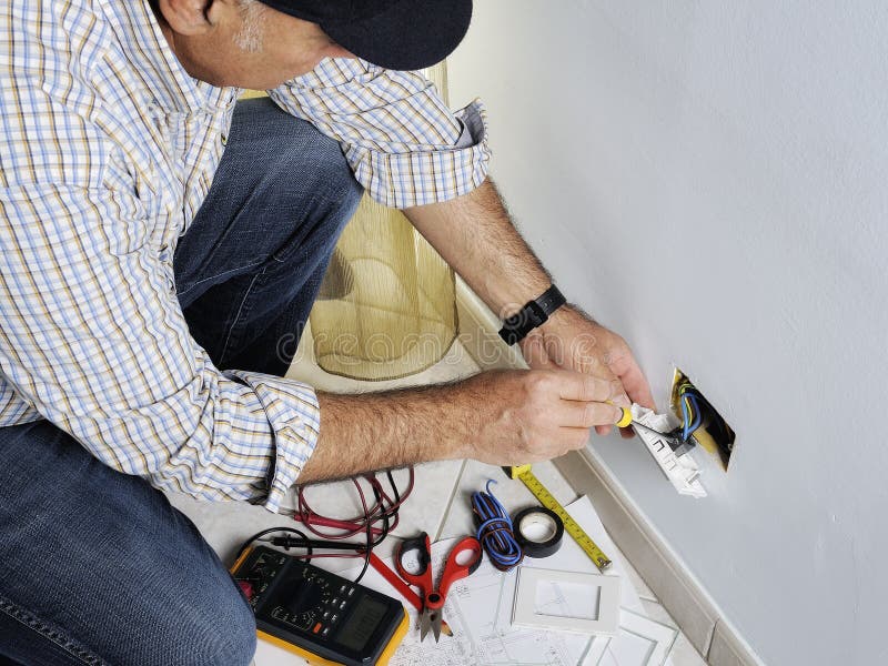 Electrician Working in a Residential Electrical System Stock Image ...