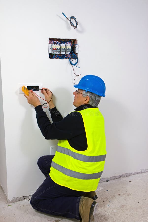 Electrician at work stock photo. Image of electric, labor - 79922802