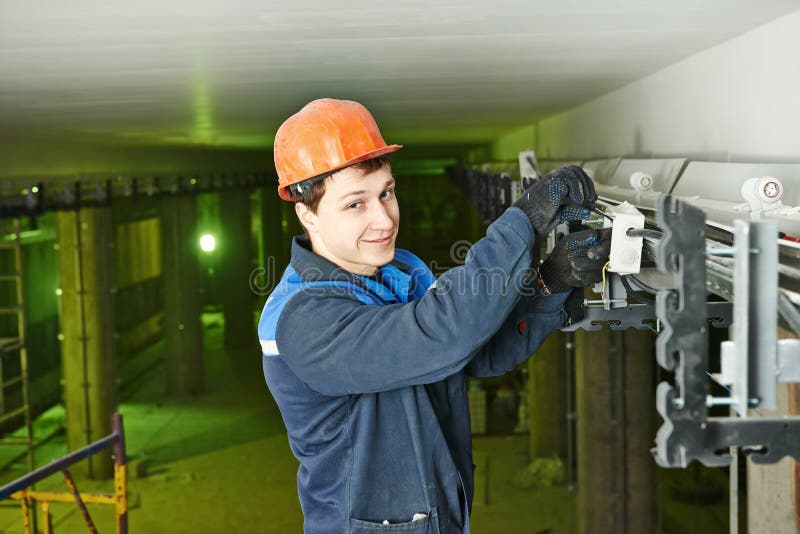 Electrician Worker at Cabling Stock Photo - Image of equipment ...