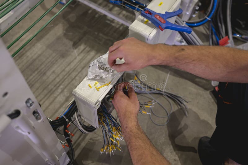 Electrician work with wire stock photo. Image of industrial - 386167630