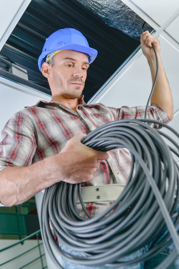 Electrician Working in Ceiling Stock Image - Image of occupation, male ...