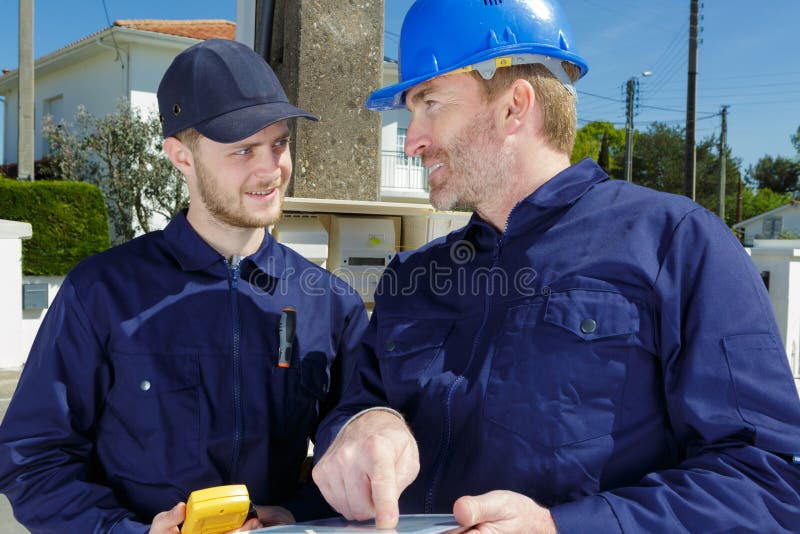 Electrician Working on Checking Equipment Outdoors Stock Photo - Image ...