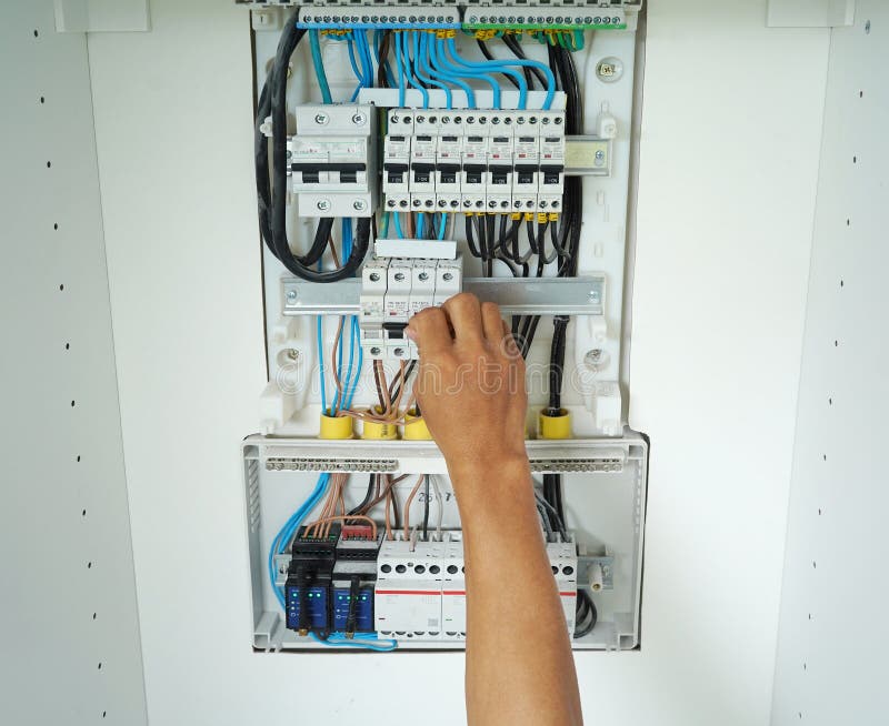 Electrician Working Checking a Switchboard with Fuses Stock Image ...
