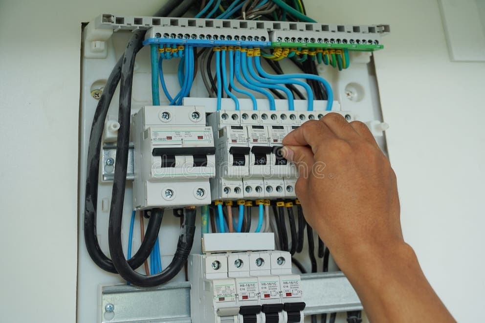 Electrician Working Checking a Switchboard with Fuses Stock Image ...