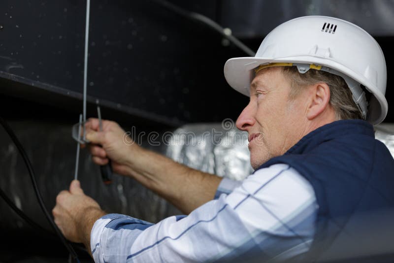 Electrician Working with Indoors Cables Stock Image - Image of angle ...