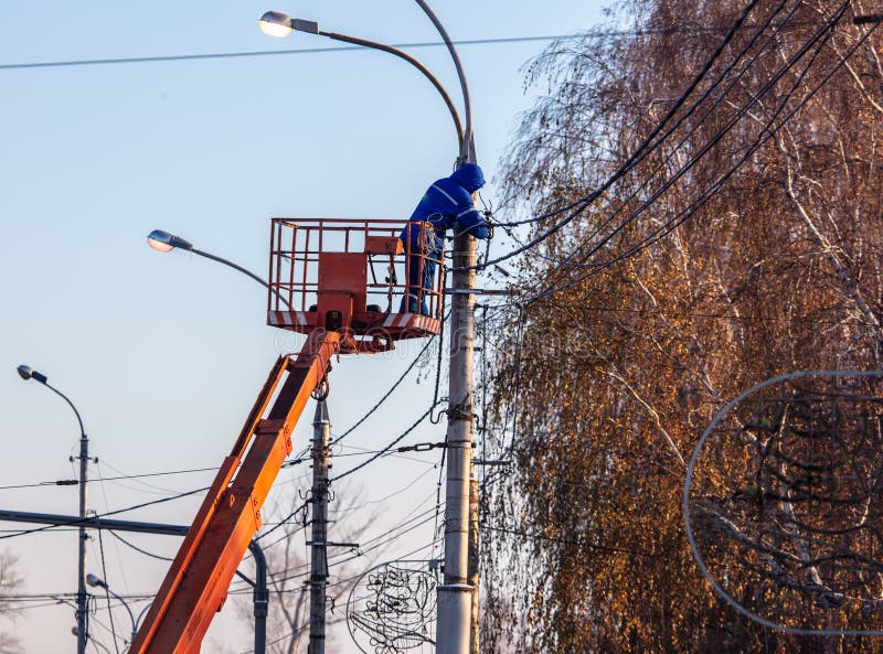 An Electrician is Working on a Pole Stock Image - Image of repair, post ...