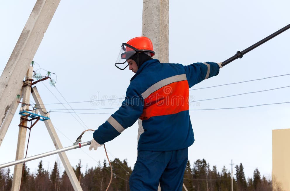 Electrician Working on Power Lines Stock Image - Image of telescopic ...