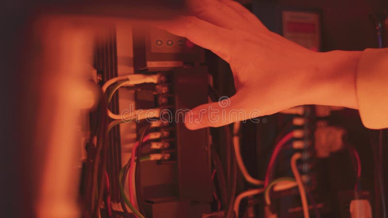 Engineer or Electrician Works with Broken Industrial Robot Cabinet ...