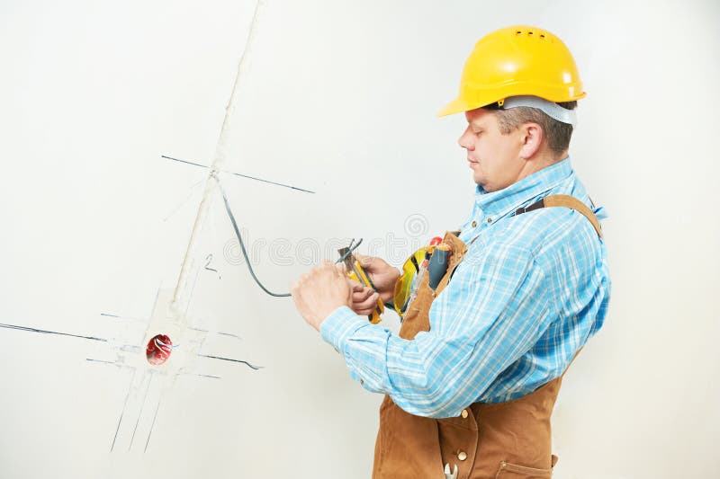 Electricians at Cable Wiring Work Stock Photo - Image of mechanic ...