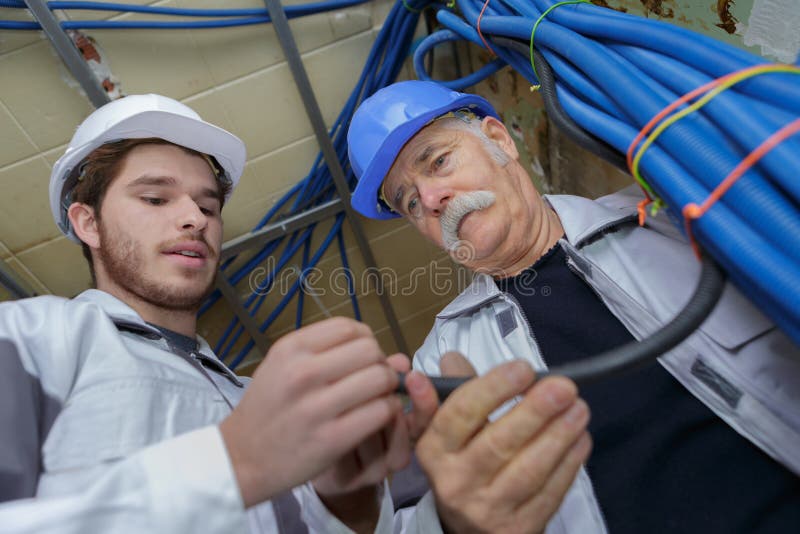 Electricians Checking Cables before Instalation Stock Image - Image of ...