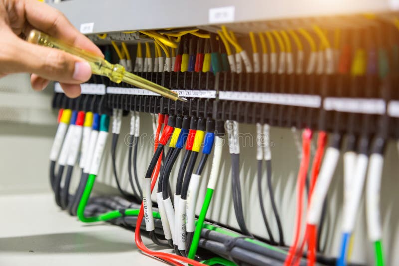 Electricians Hands Testing Current Electric in Control Panel Stock ...