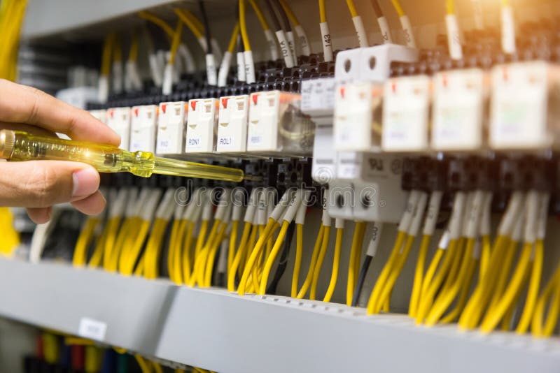 Electricians Hands Testing Current Electric in Control Panel Stock ...