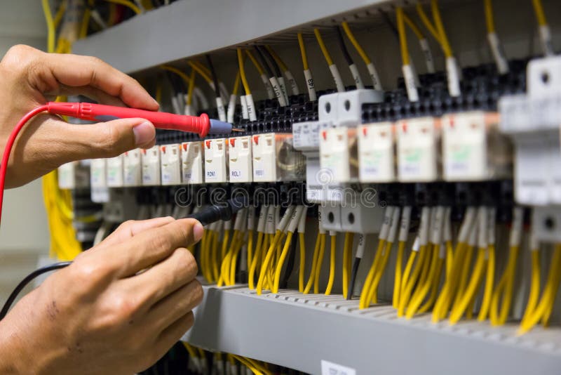 Electricians Hands Testing Current Electric in Control Panel Stock ...