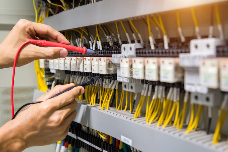 Electricians Hands Testing Current Electric in Control Panel Stock ...