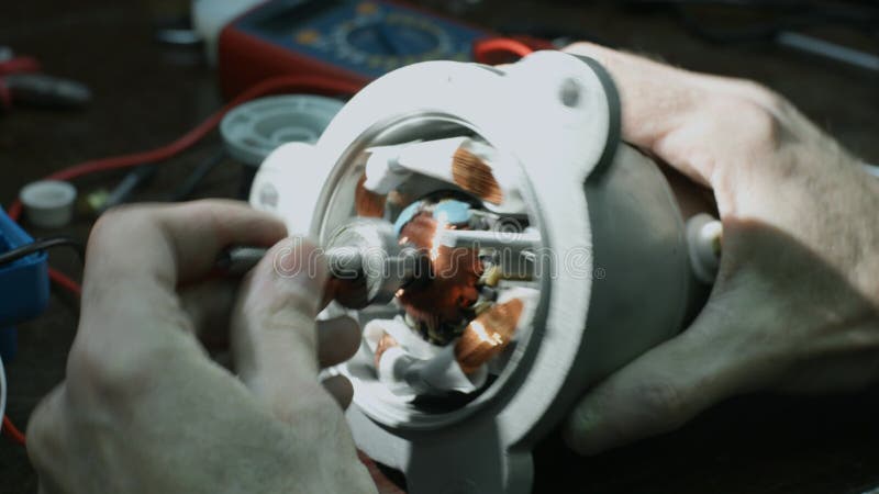 Electricians Hands Testing Current Electric in Control Panel ...