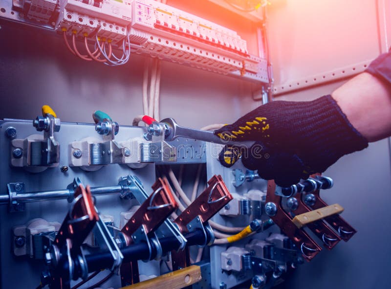 Electricians Hands Testing Switches in Electric Box. Electrical Panel ...