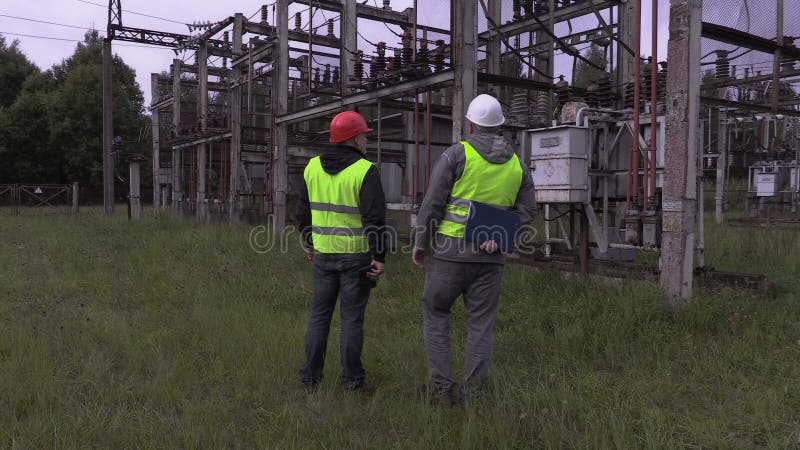 Electricians Talking in Electrical Substation Stock Video - Video of ...