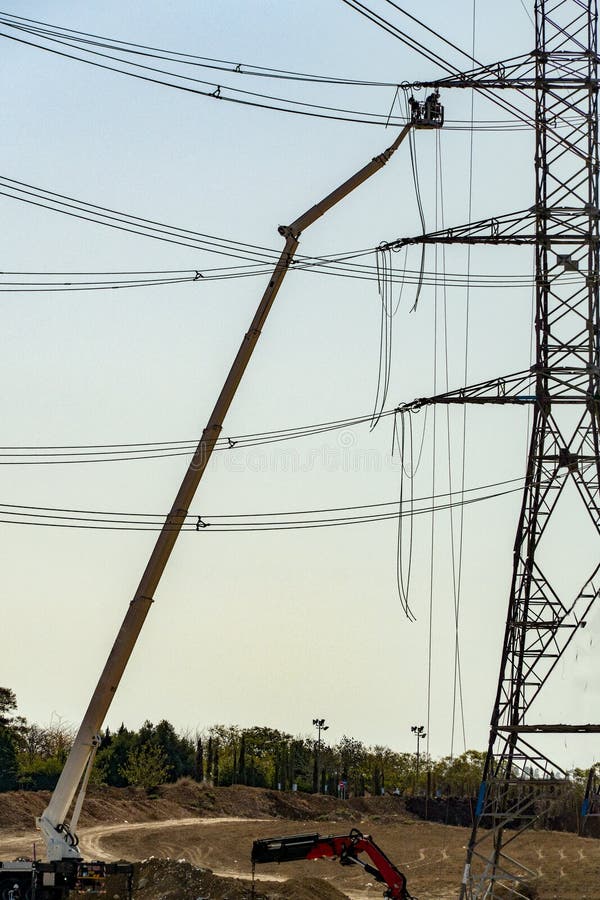 Electricians are Working on New Electrical Lines Stock Photo - Image of ...