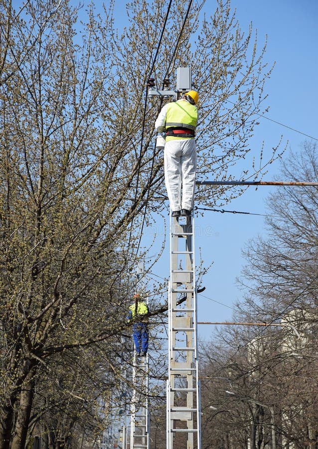 Electricians are working stock photo. Image of suit, metal - 61003530