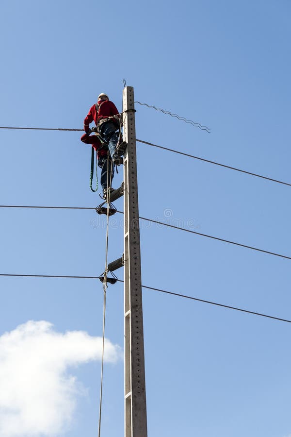 Electricians Working on a Pylon Stock Photo - Image of light, technical ...