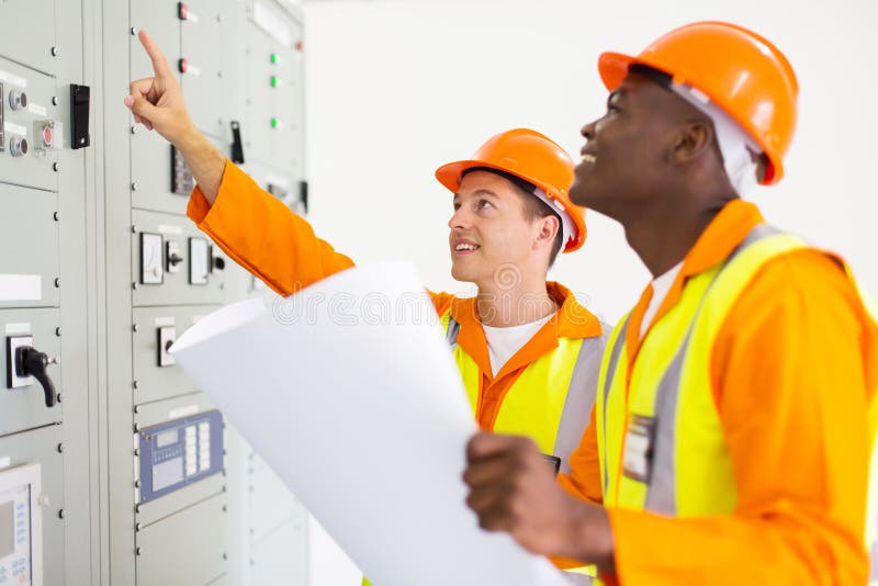 Electricians Working Together Stock Image - Image of diversity, adult ...
