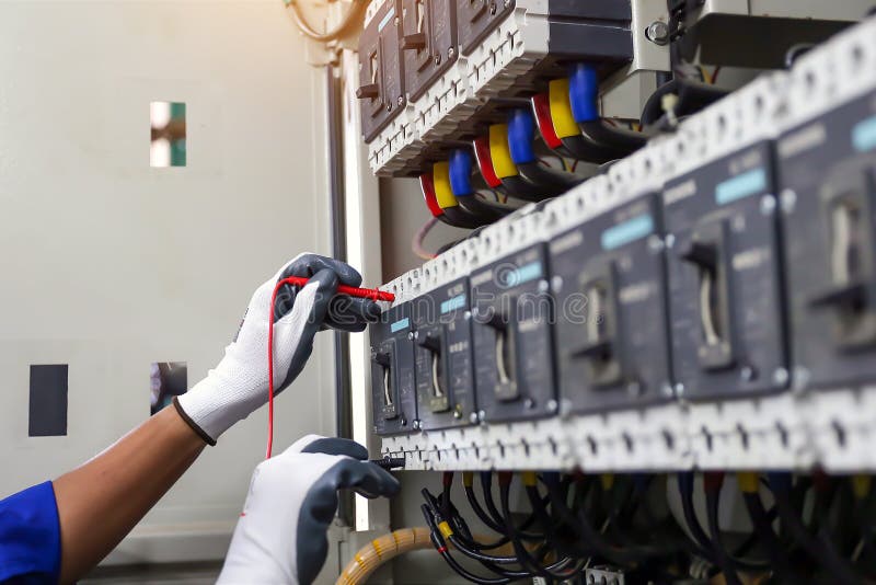 Electricity or Electrical Maintenance Service, Engineer Hand Checking ...