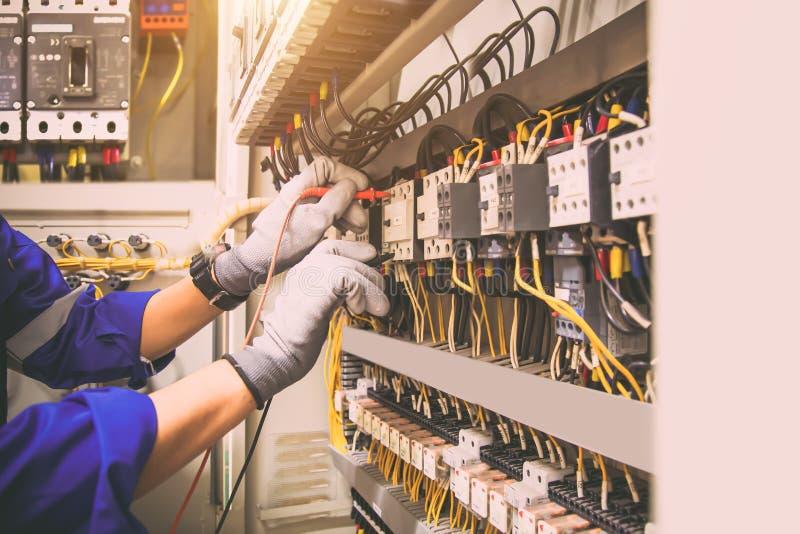 Electricity or Electrical Maintenance Service, Engineer Hand Checking ...