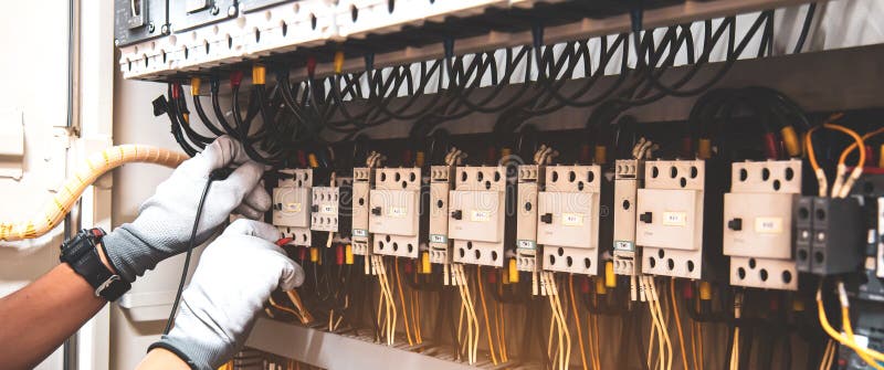 Engineer Hand Holding AC Voltmeter Checking Electric Current Voltage at ...