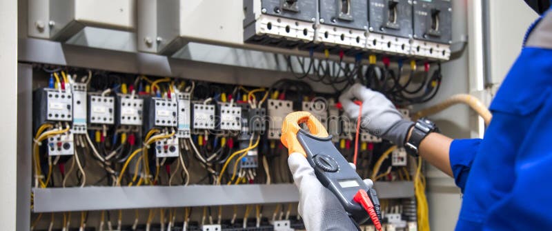 Electricity and Electrical Maintenance Service, Engineer Hand Holding ...