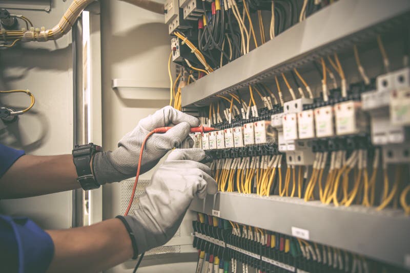 Engineer Using Measuring Equipment Tool Checking Electric Current ...
