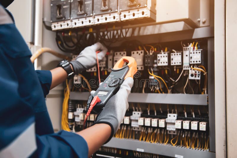 Engineer Using Measuring Equipment Tool Checking Electric Current ...