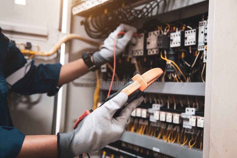 Engineer Using Measuring Equipment Tool Checking Electric Current ...