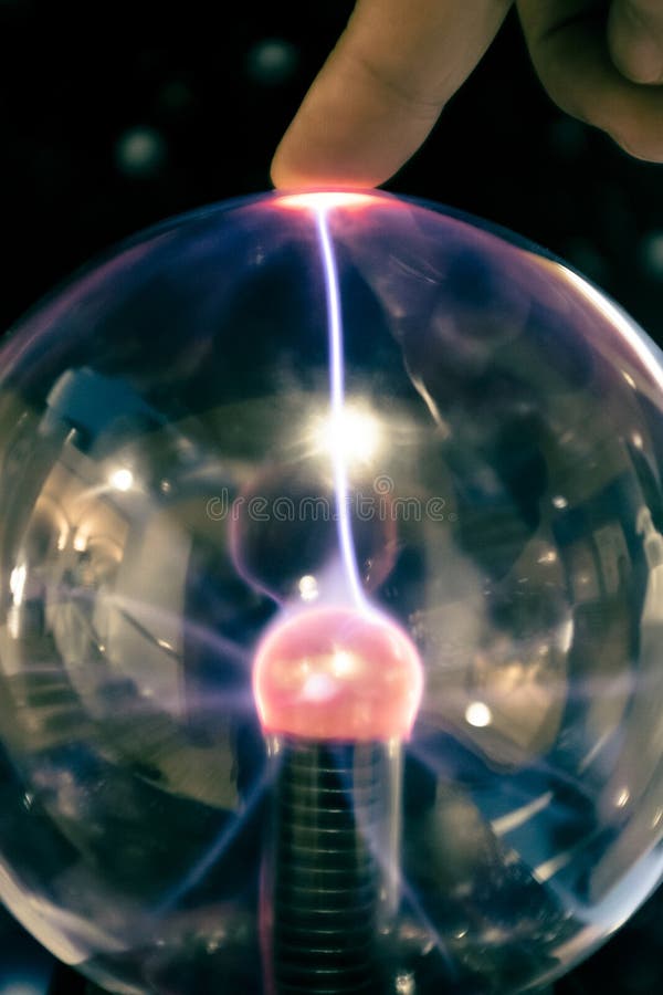 Electricity Lighting Ray Going To a Finger Hand on a Powerful Spark ...