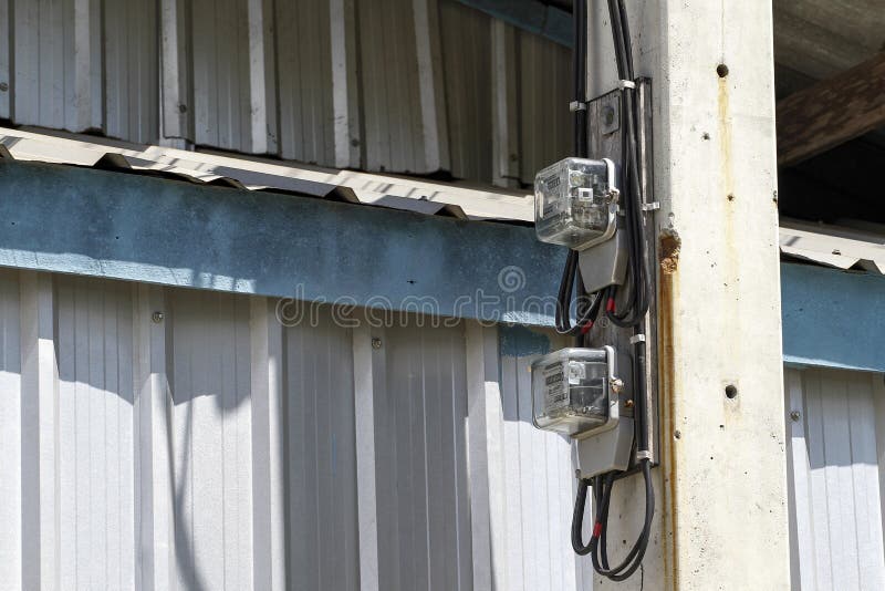 The Electricity Meter on Pole in Front of Home Stock Image - Image of ...
