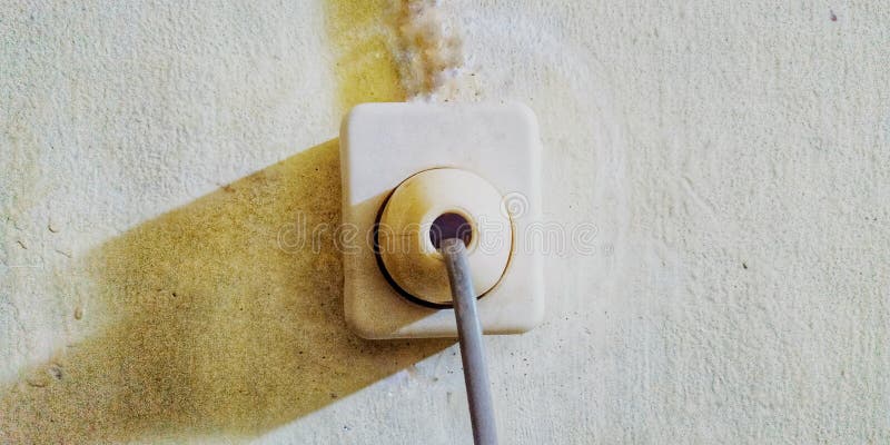 Electricity Plugs and Cable on Wall Stock Photo - Image of electricity ...